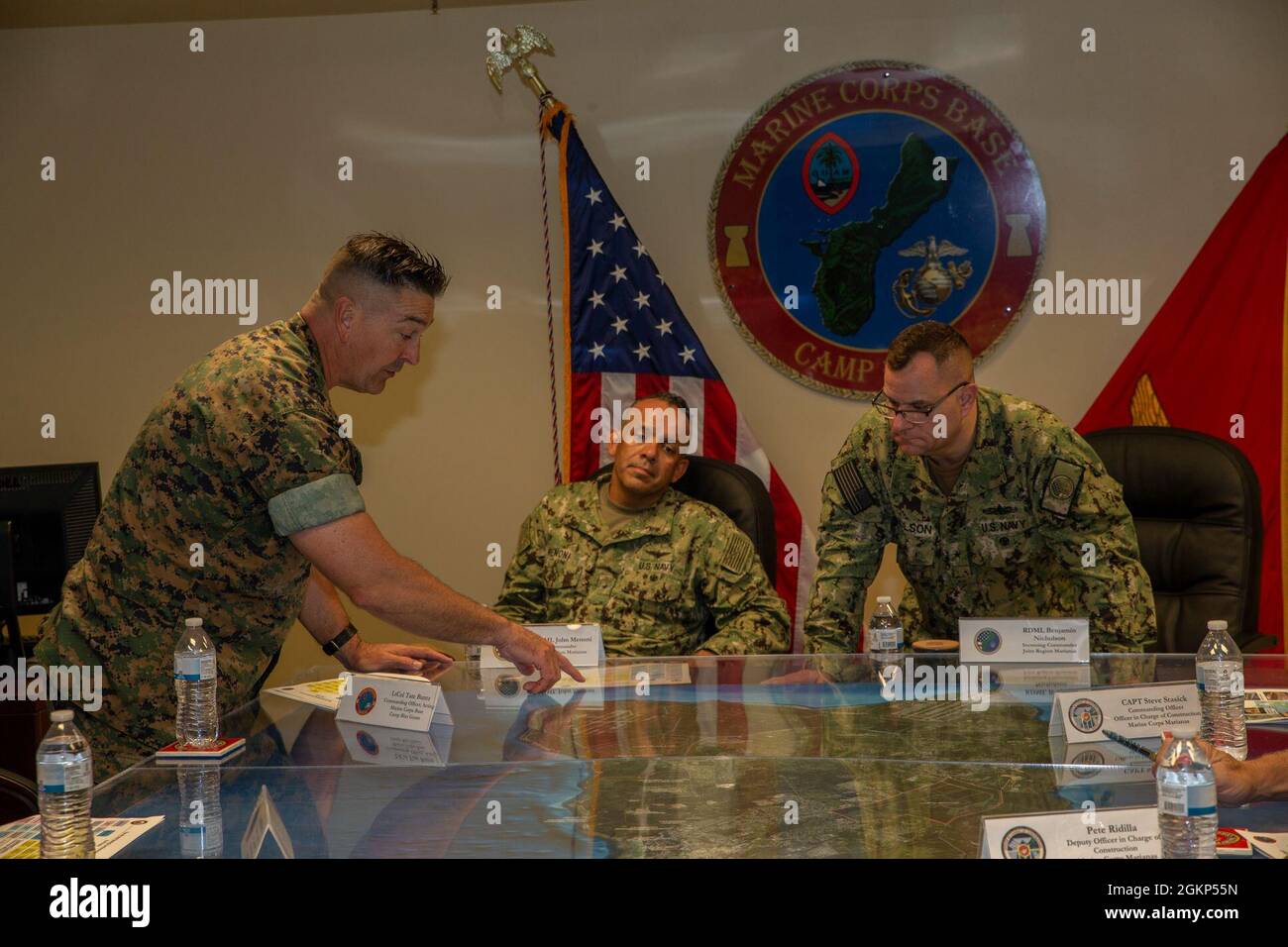 Lt. Col. Tate Buntz, the Marine Corps Base (MCB) Camp Blaz Operations Officer, left, briefs Rear ...