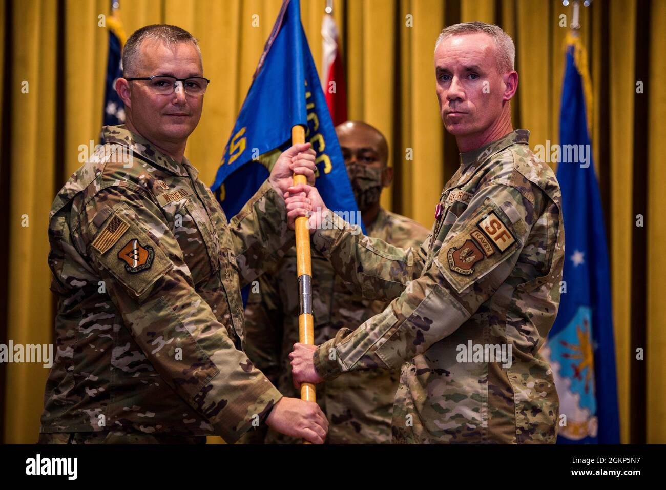 Lt. Col. John Sullivan (right), outgoing 39th Security Forces Squadron ...