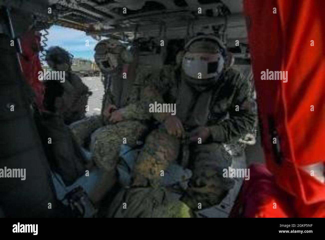 U.S. Navy Rear Adm. Robert Katz, center, commander, Expeditionary ...