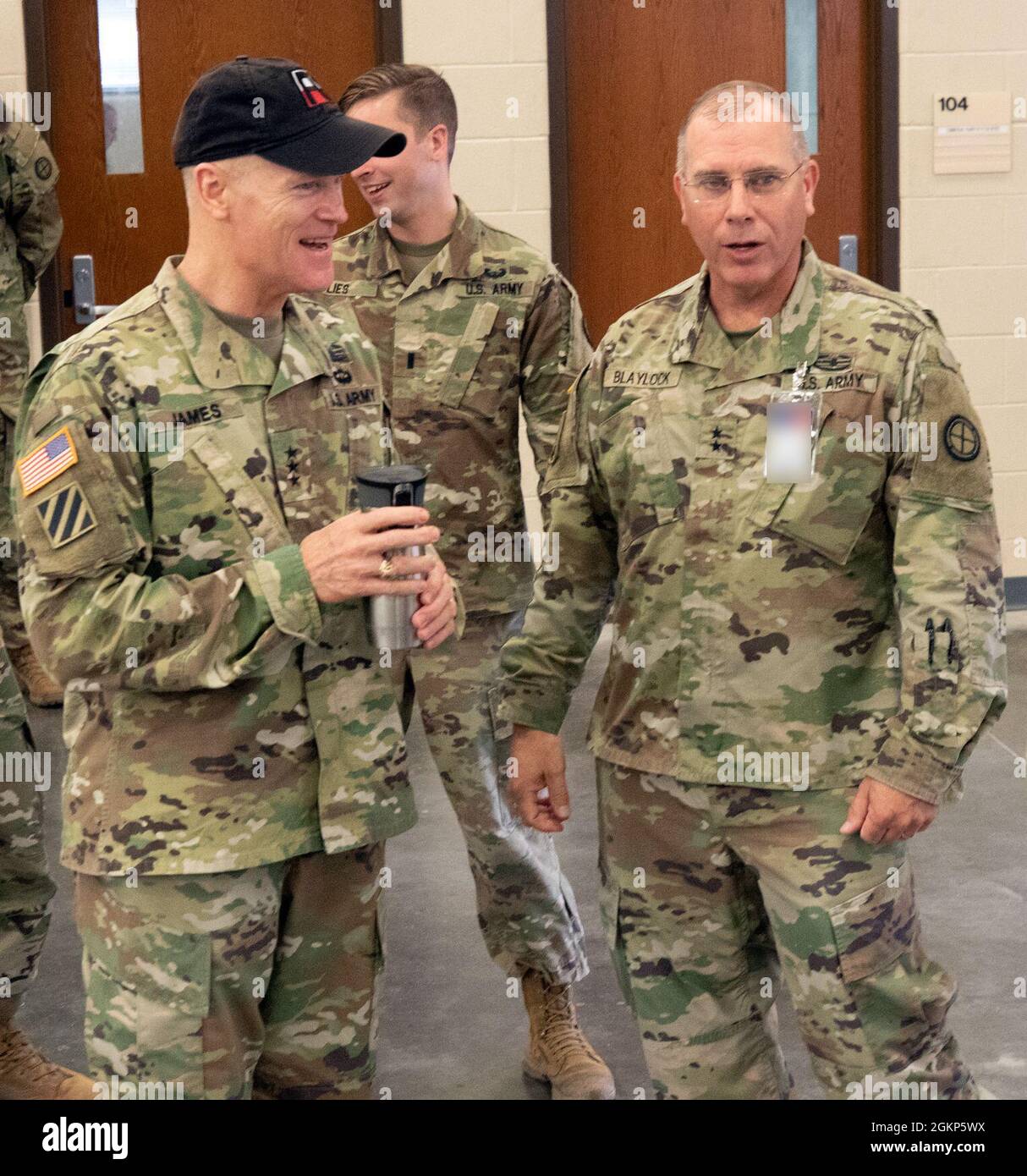 Lt. Gen. Thomas James Jr. (left), First Army commanding general, talks ...