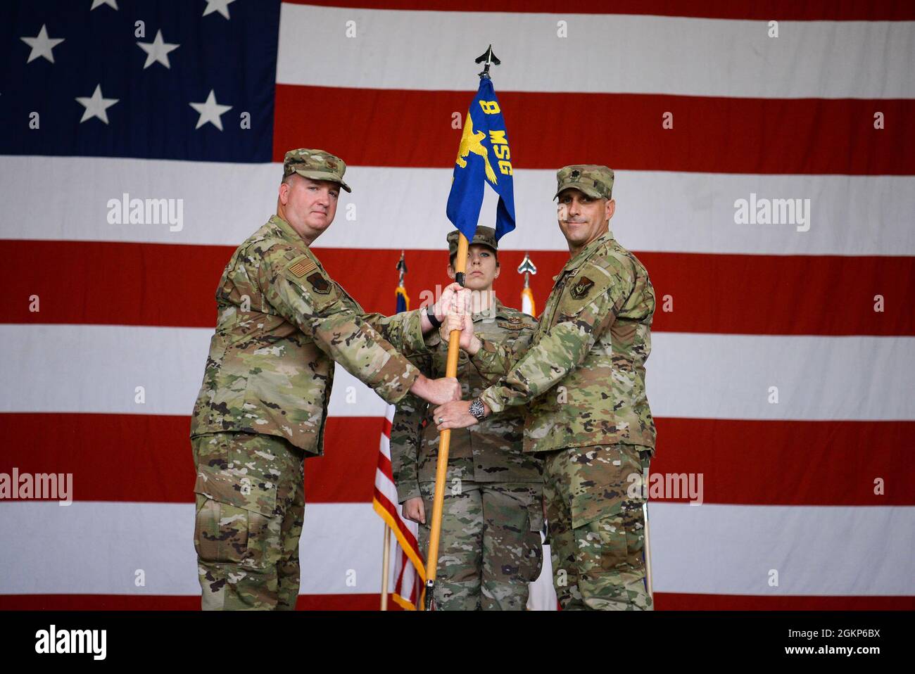 Col. Robert Bartlow, 8th Mission Support Group commander, presents the ...