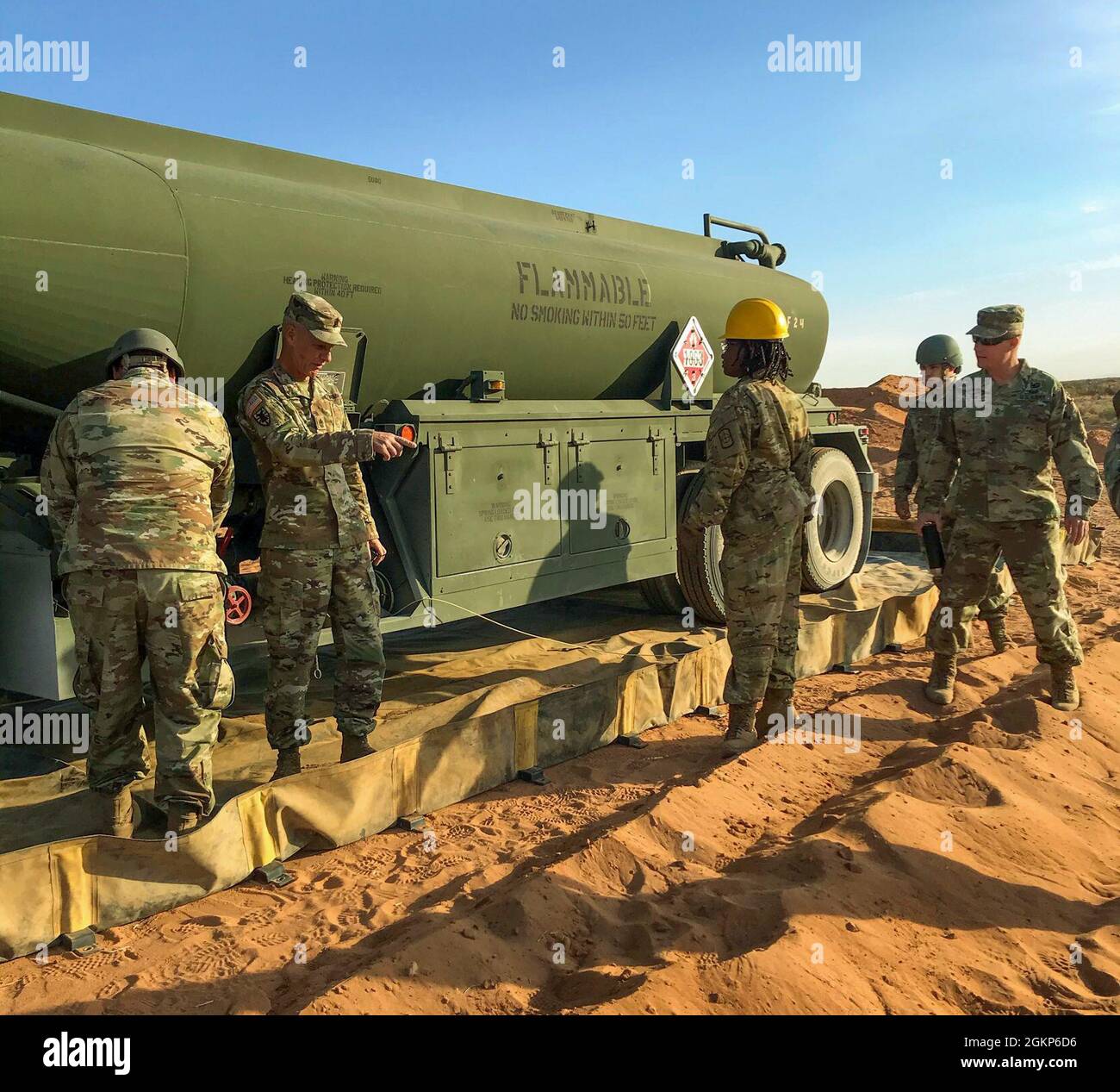 Sergeant Maj. Glenn Melby, second from left, S4 noncommissioned officer ...
