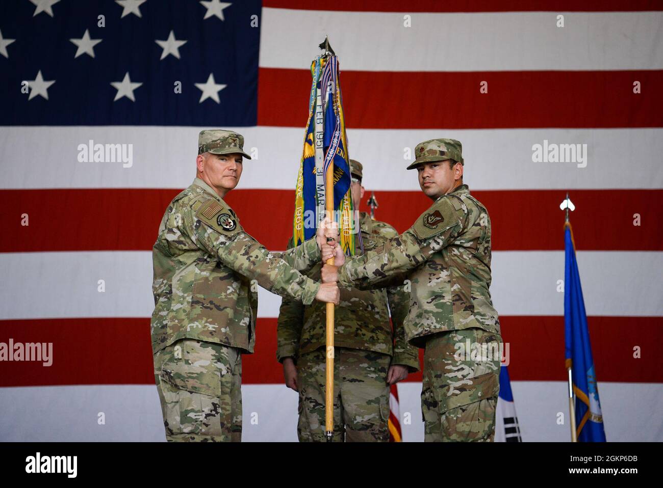 Col. Todd Wydra, 8th Maintenance Group commander, presents the ...