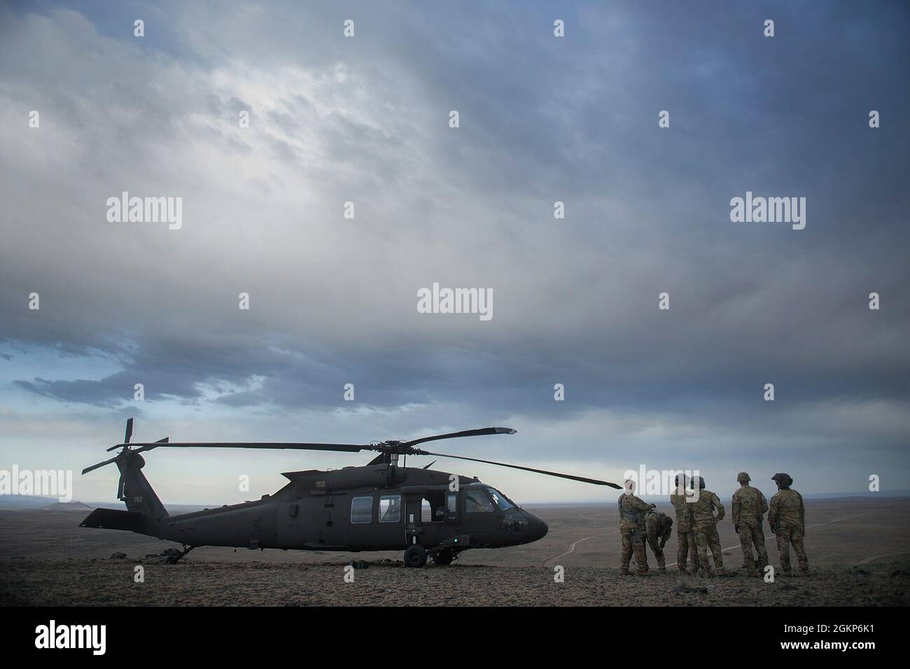 After landing on a small butte overlooking the gunnery range, soldiers ...