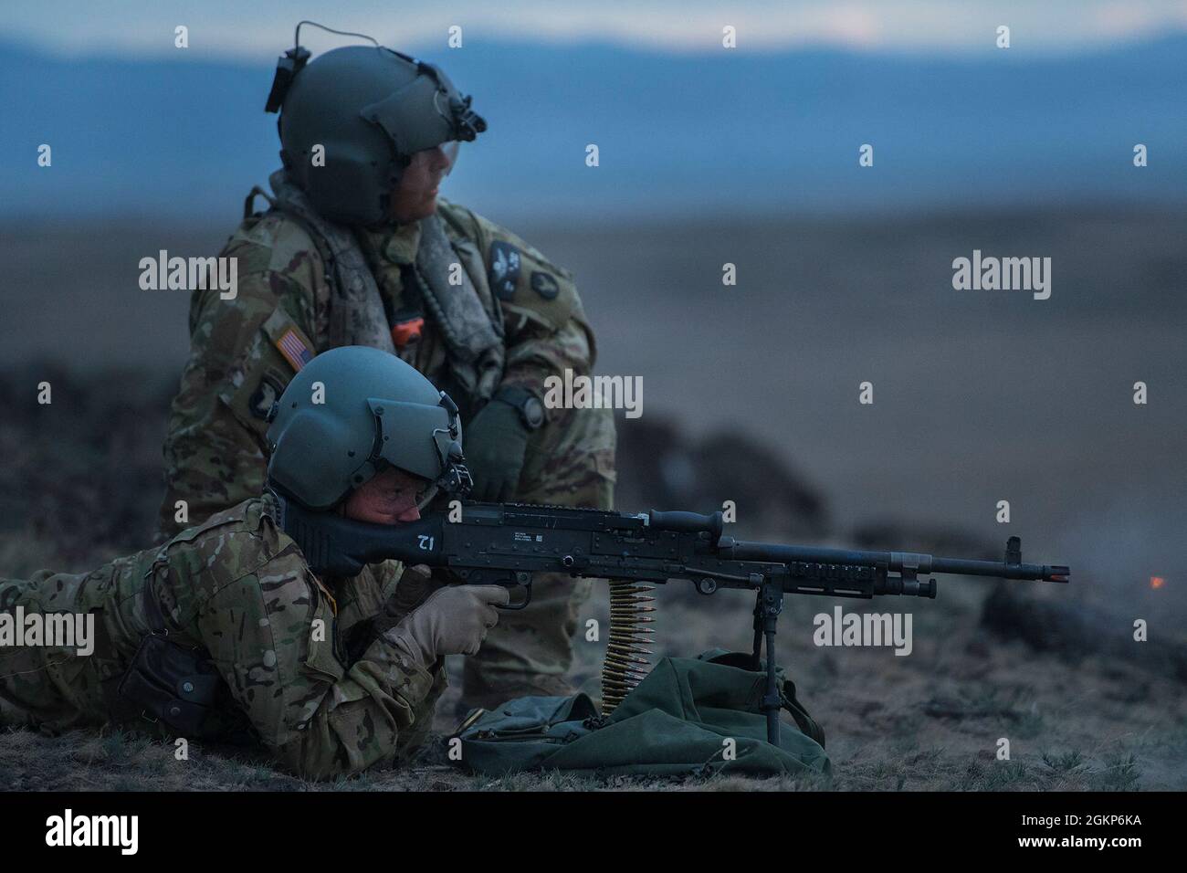 Firing from a prone position at the gunnery range below. The Idaho Army ...