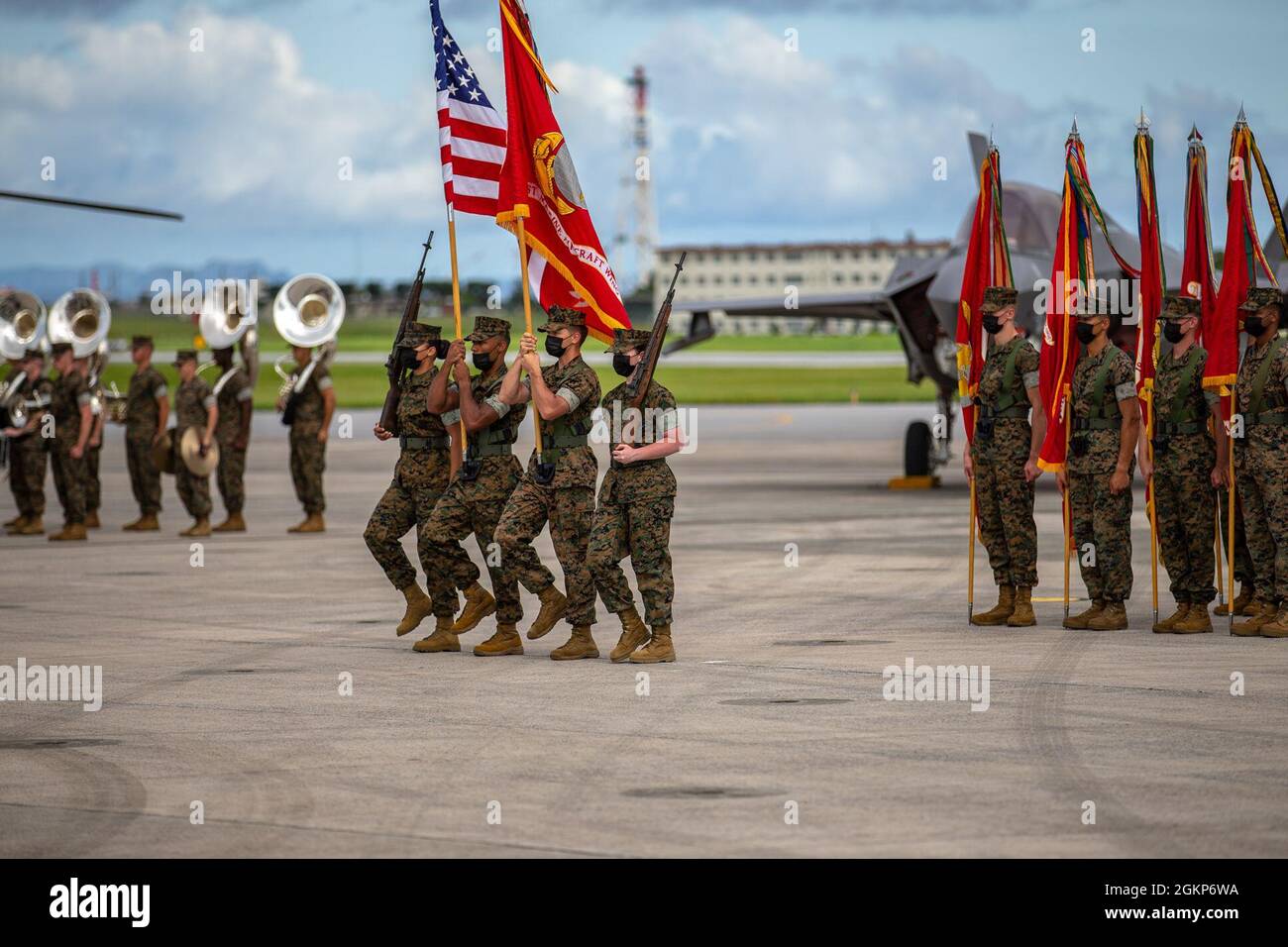 1st Marine Aircraft Wing (MAW) color guard marches on the colors during ...