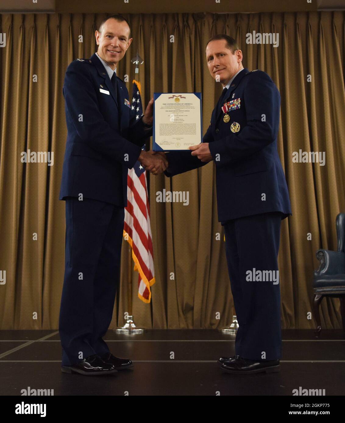 Col. Jonathan Compton, 319th Medical Group commander, awards Lt. Col ...
