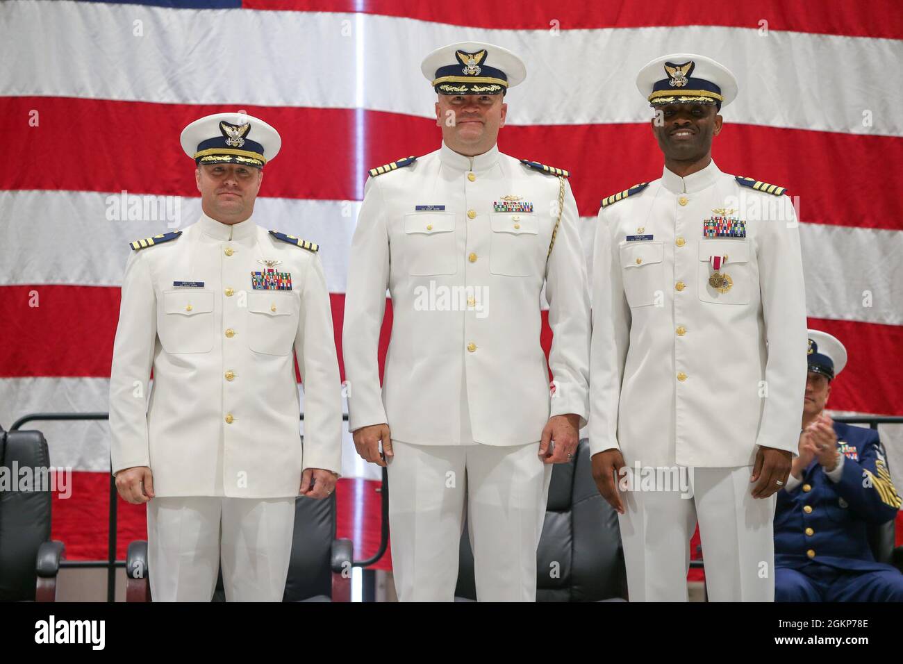 Cmdr. Ryan Matson, Capt. John Reed and Capt. Marcus Canady pose for a ...