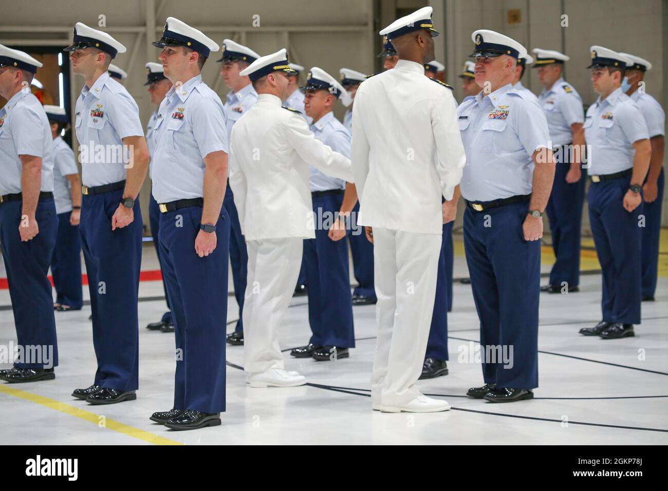 Cmdr. Ryan Matson and Capt. Marcus Canady conduct a personnel ...
