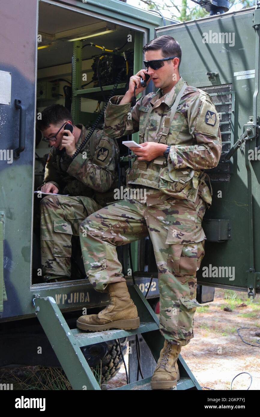 U.S. Army Sgt. Charles Scott (right) and Spc. Jackson Ratliff assigned ...