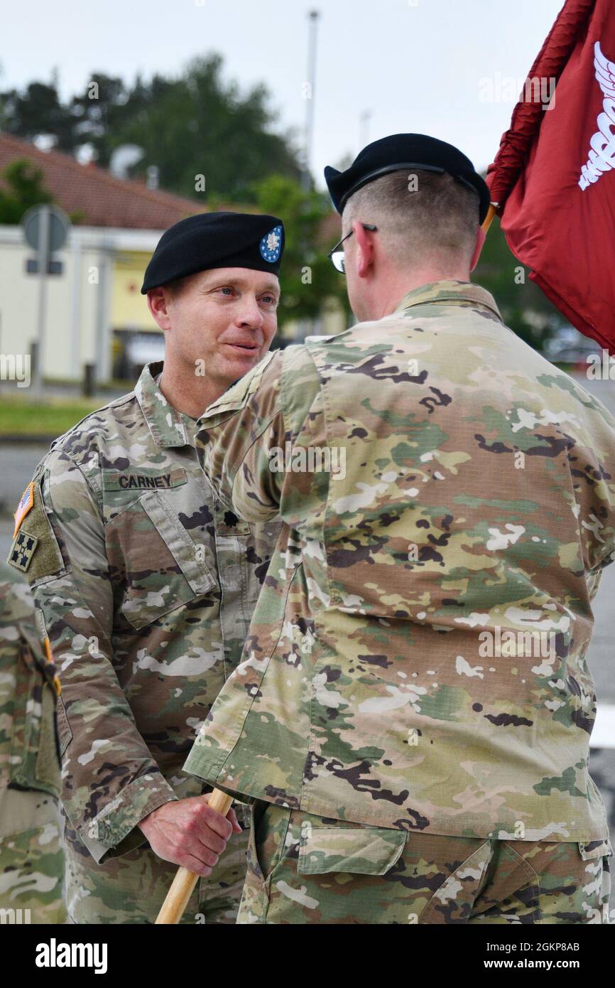 U.S. Army Lt. Col. Avery J. Carney, left, U.S. Army Health Clinic ...
