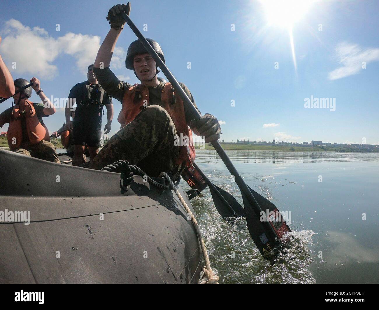 Ukrainian Marines with the 36th Marine Brigade row a combat rubber ...