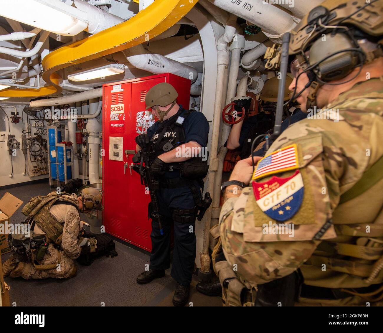 210611-N-JW440-1017 PHILIPPINE SEA (June 11, 2021) Explosive Ordnance Disposal Technicians ...