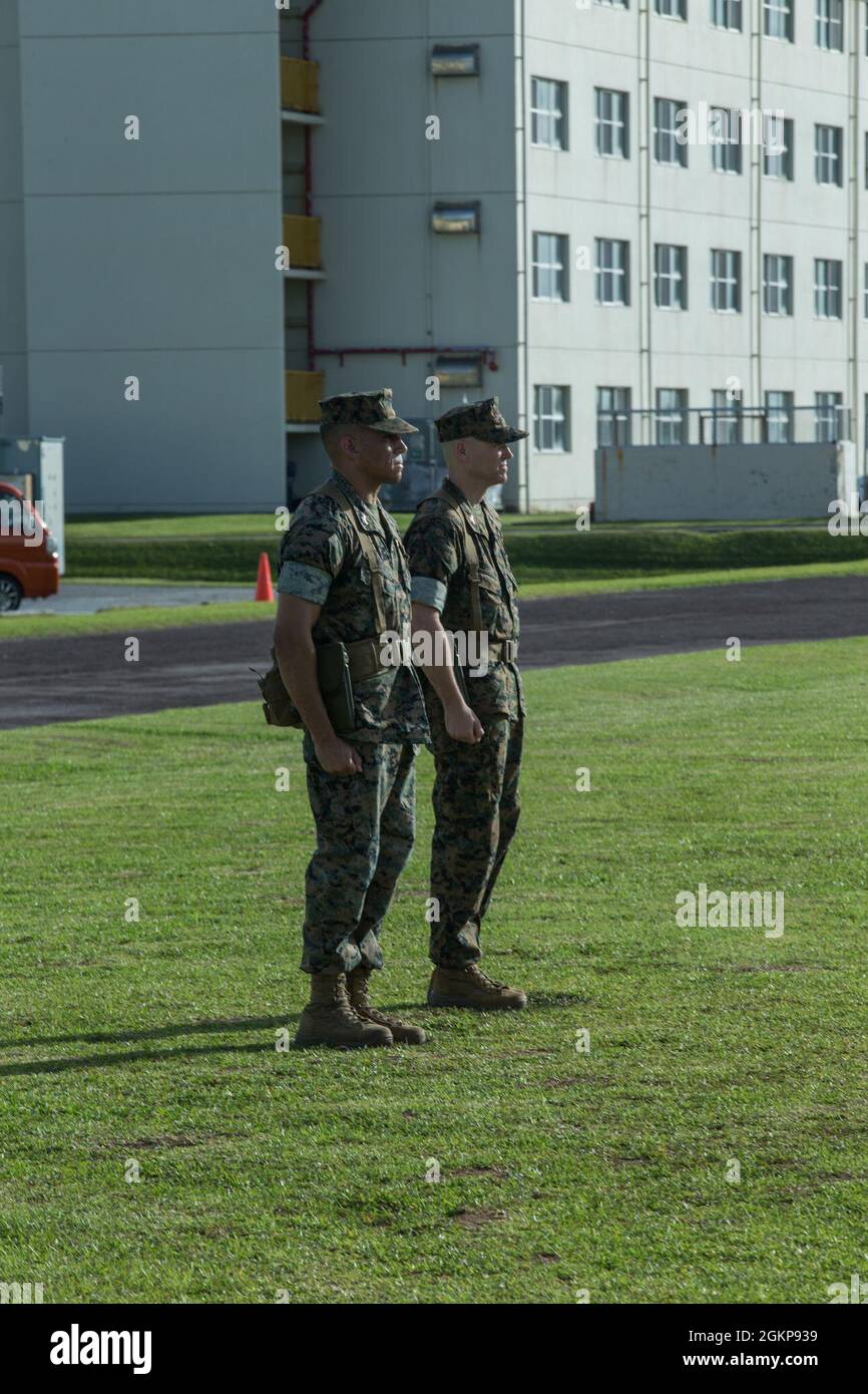U.S. Marine Corps Col. Omar Randall, left, off-going commanding officer ...