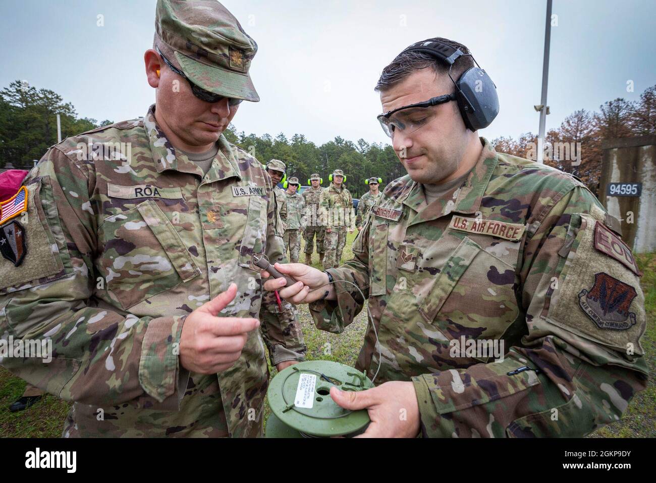 U.S. Air Force Staff Sgt. Russell J. Bongiovanni, right, explosive ...
