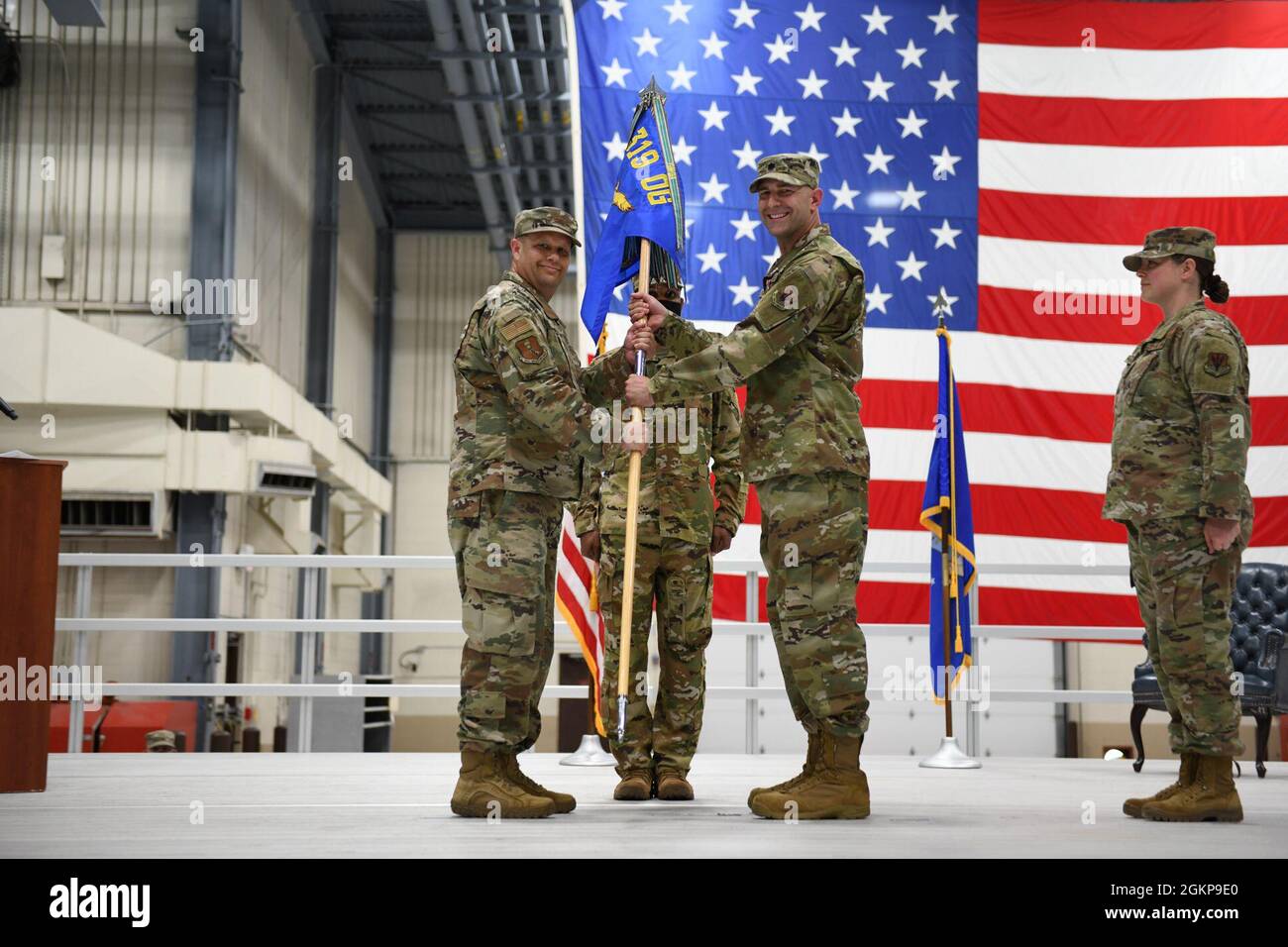 Col. Jason Dillon, 319th Operations Group commander, receives the ...