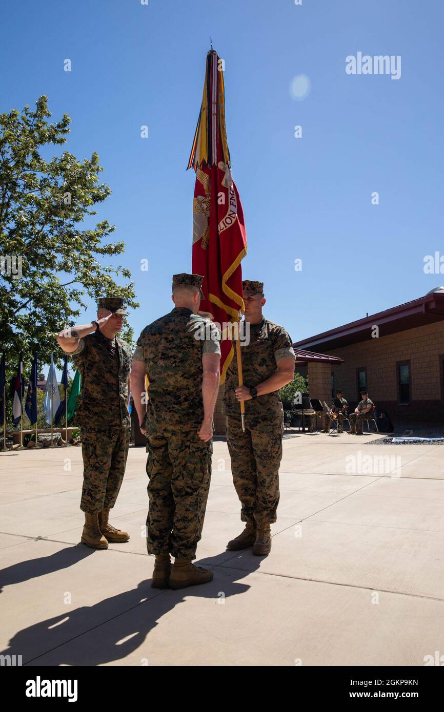 U.S. Marine Corps Lt. Col. Jason C. Armas (right), the outgoing ...