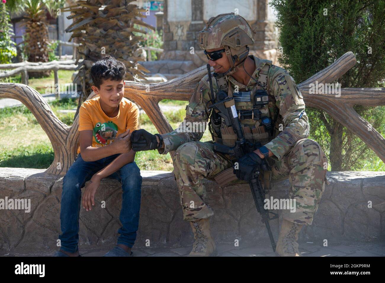 U.S. Army Soldier interacts with local civilians during Civilian Leader ...