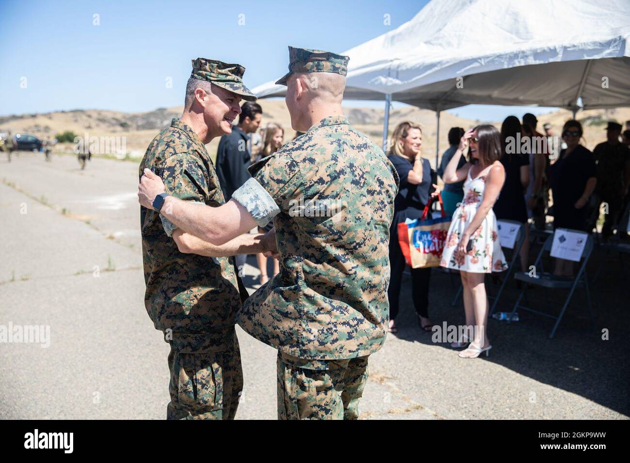 U.S. Marine Corps Lt. Col. Bart P. Lambert (left), the incoming ...