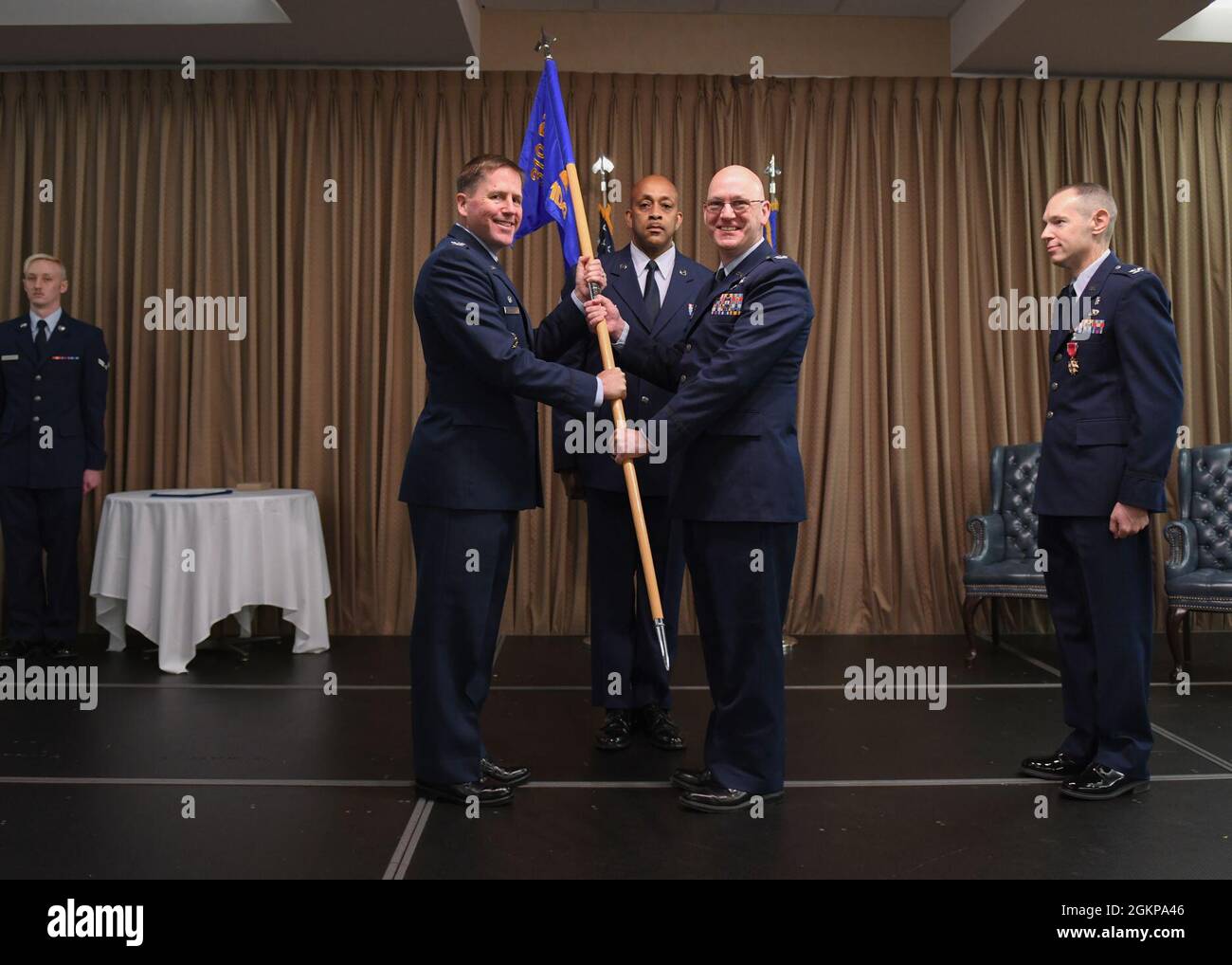 Col. Cameron Pringle, 319th Reconnaissance Wing commander, passes the ...