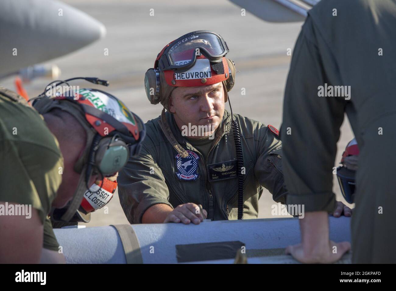 U.S. Marine Staff Sgt. Dustin Cheuvront, an aircraft ordnance ...