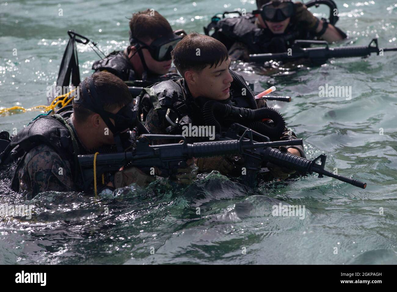 U.S. Marine Corps Cpl. Arne Bye, center, a native of Columbia, Tn., and ...