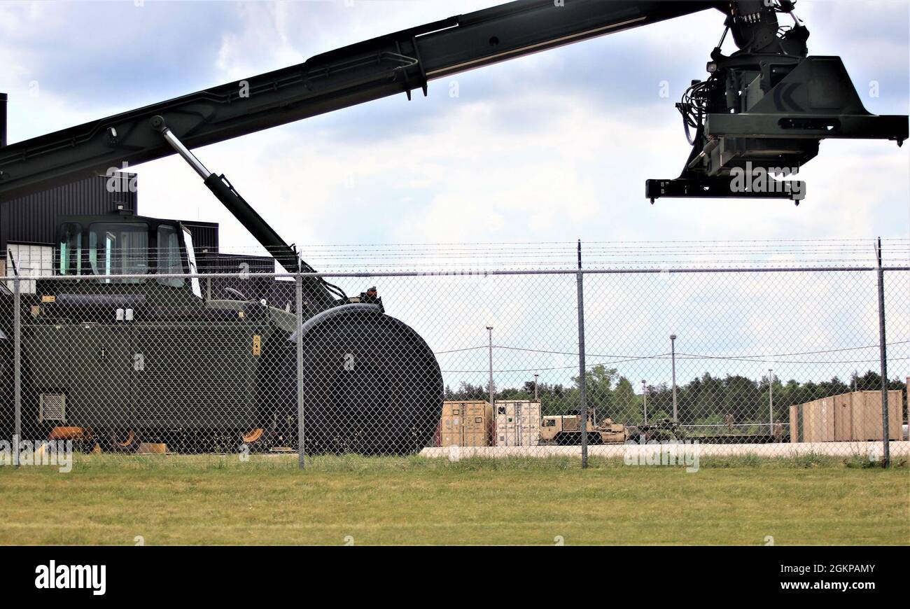 An Army Standard 50,000-pound-capable Rough Terrain Container Handler ...