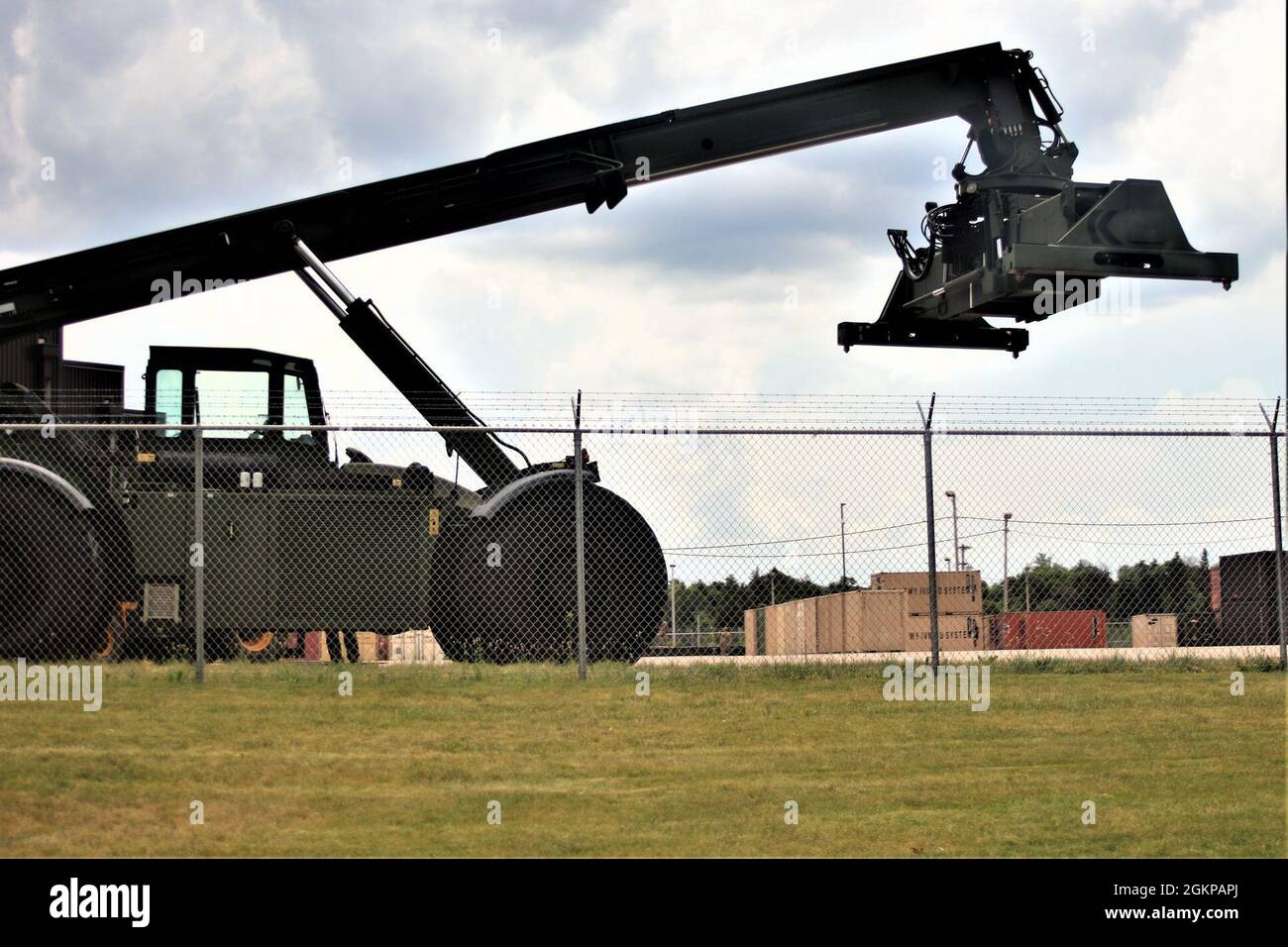 An Army Standard 50,000-pound-capable Rough Terrain Container Handler ...