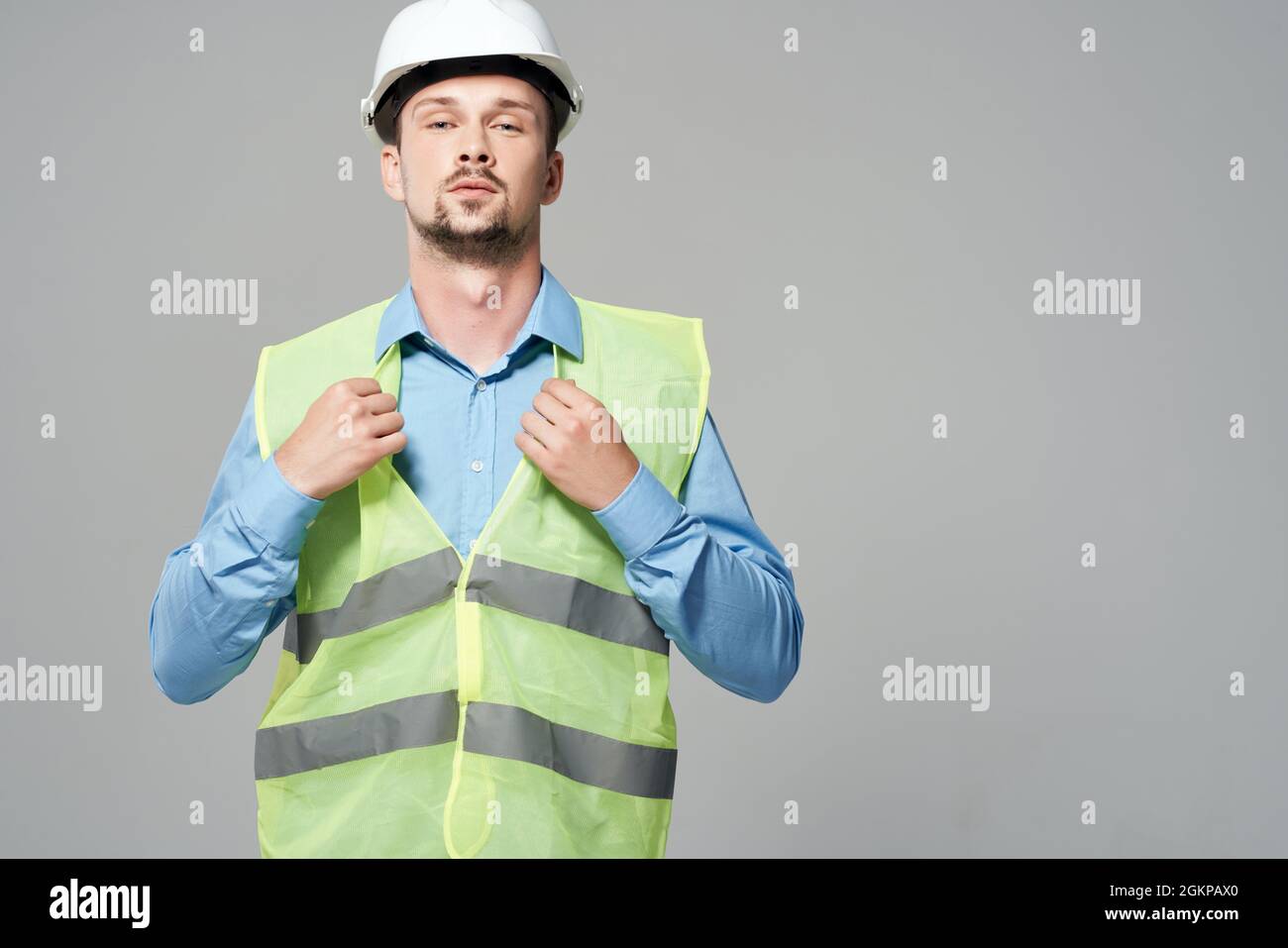worker in a white helmet engineer safety light background Stock Photo ...