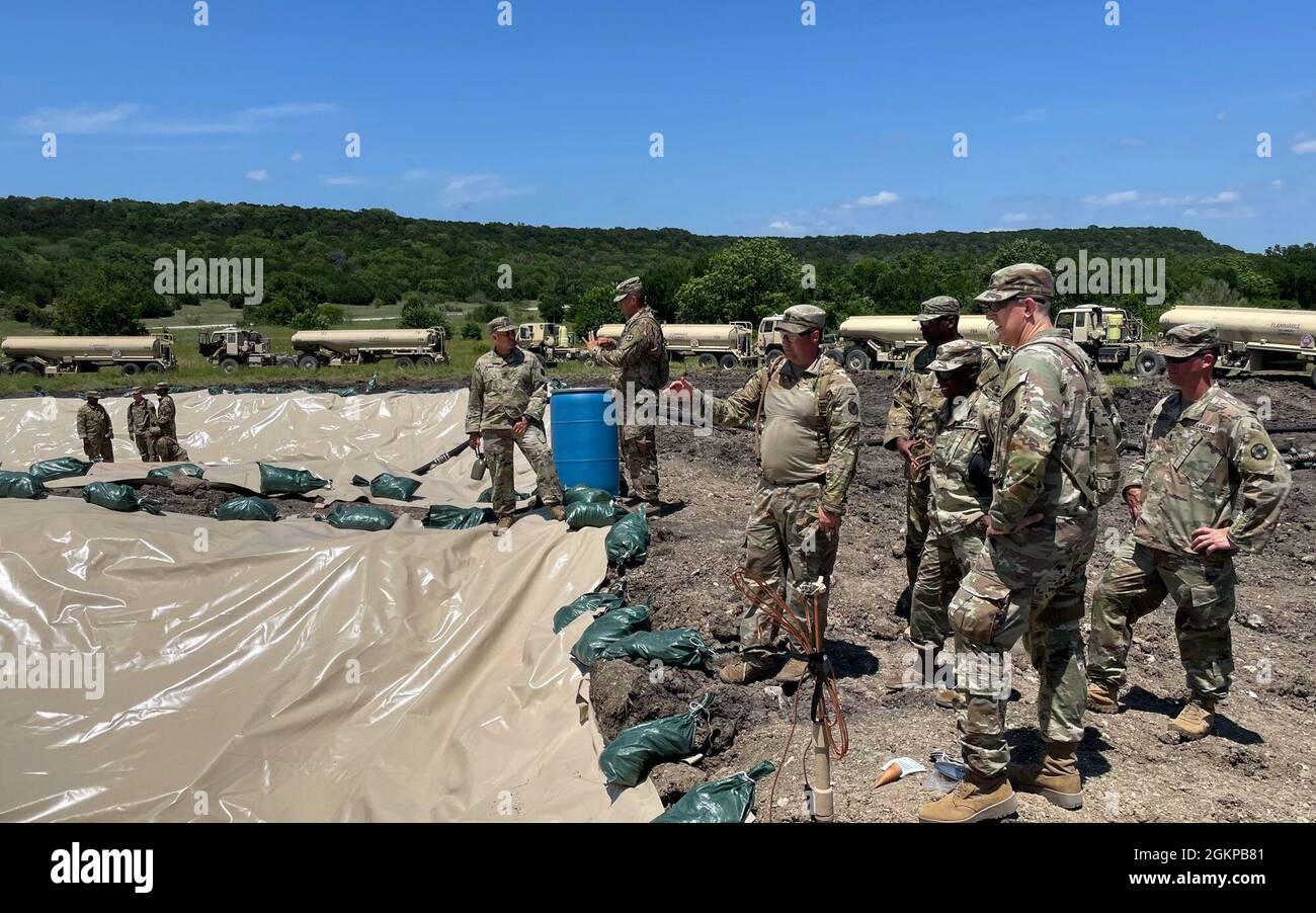 Capt. Bryan Miller (center right), Commander, 53rd Quartermaster ...