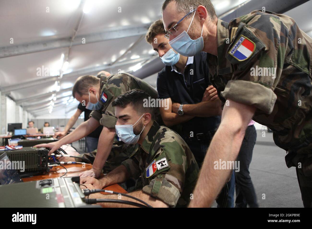 French service members testing the Federated Mission Networking (FMN ...