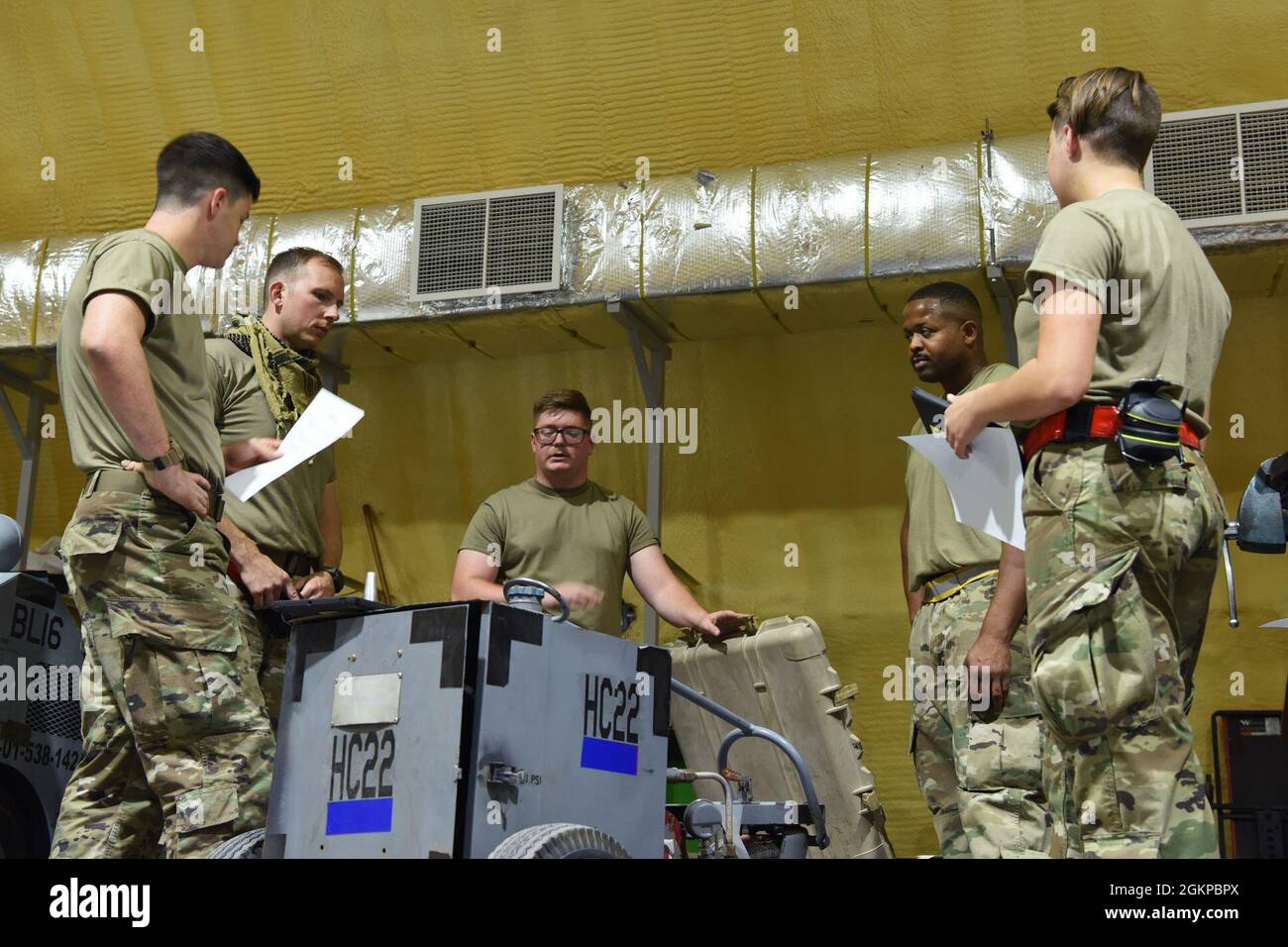 U.S. Air Force Senior Airman Devin Shoemaker (center) and U.S. Air ...