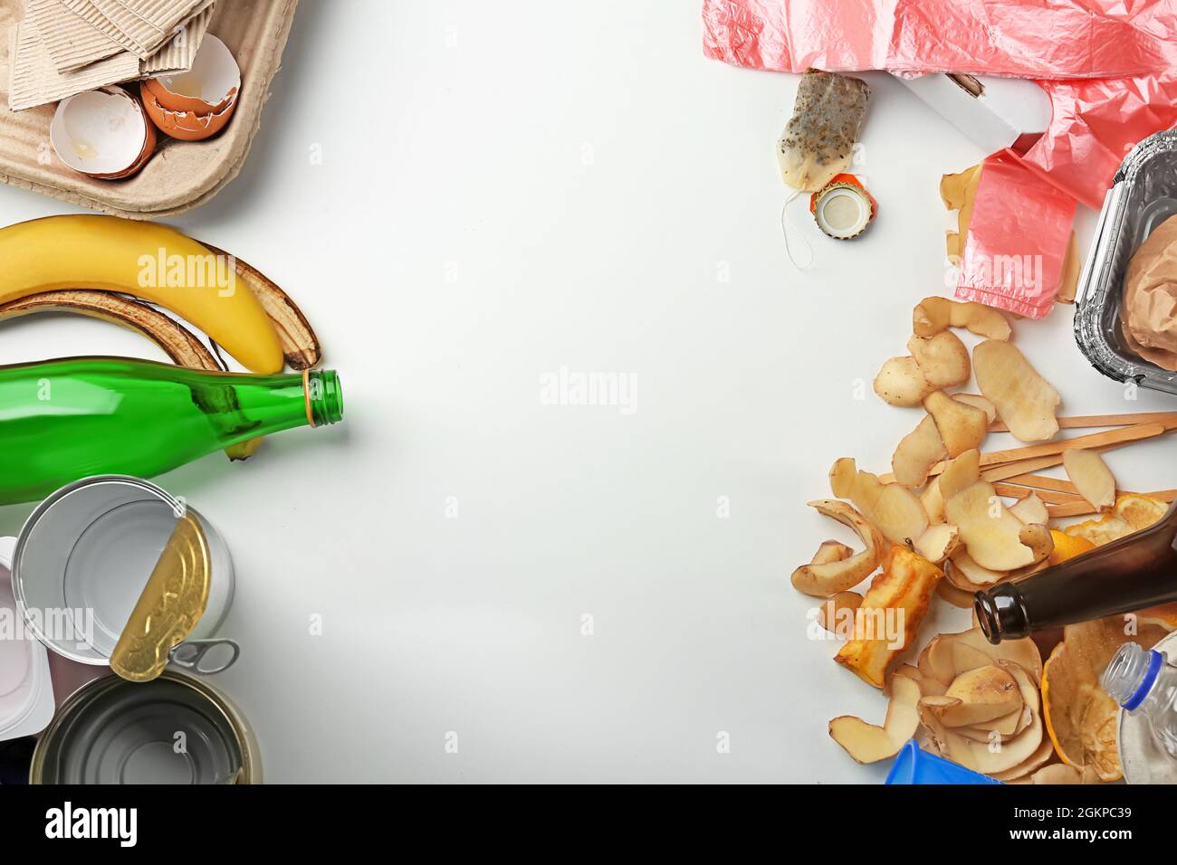 Composition with garbage on white background Stock Photo - Alamy