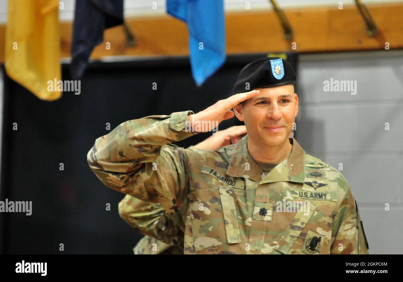 Lt. Col. Denis J. Fajardo salutes during the playing of the national ...