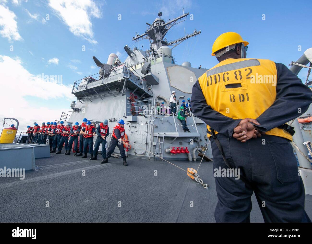 Sailors assigned to the Arleigh Burke-class guided missile destroyer ...