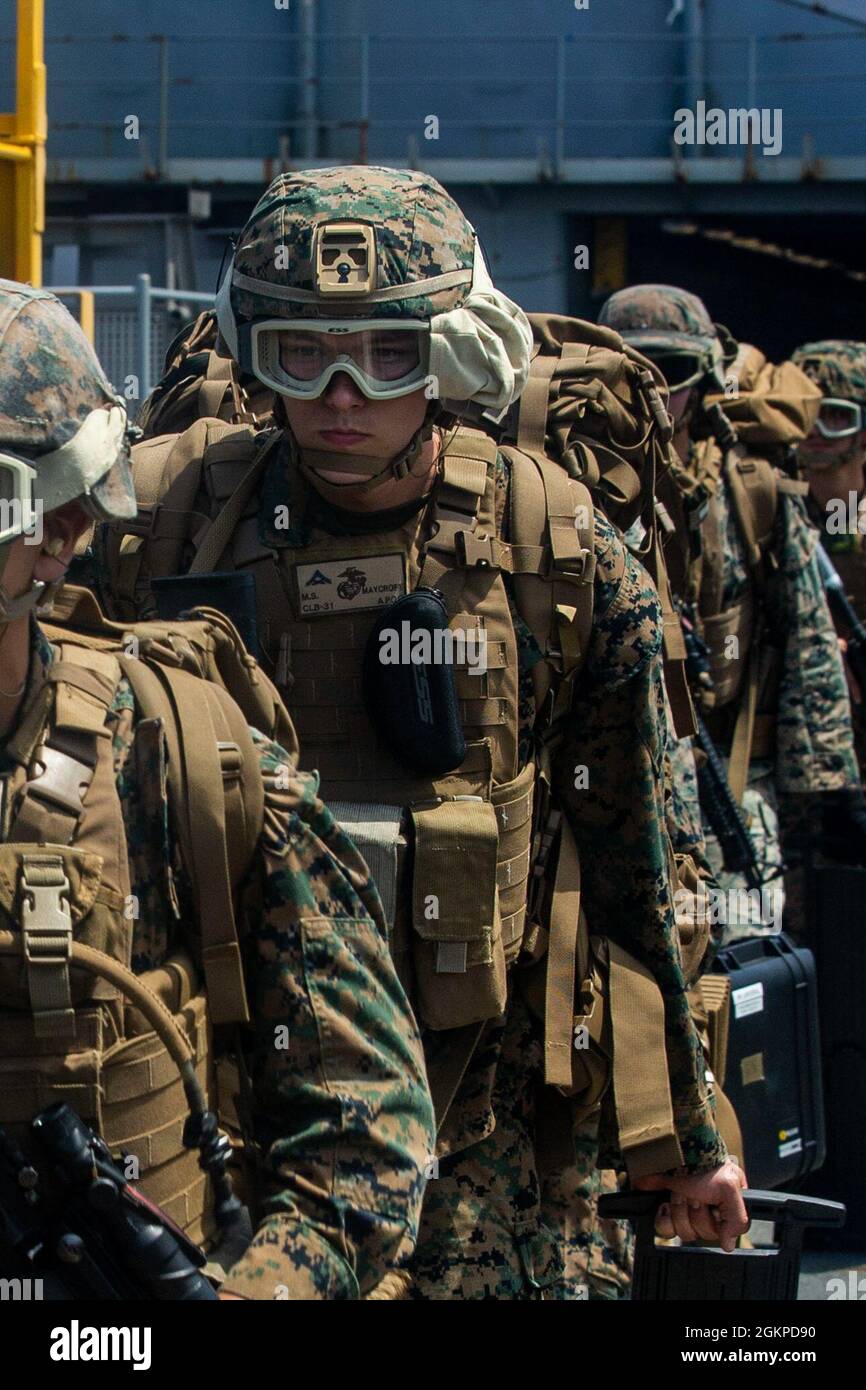 U.S. Marine Corps Lance Cpl. Daniel Maycroft, a radio operator with the ...