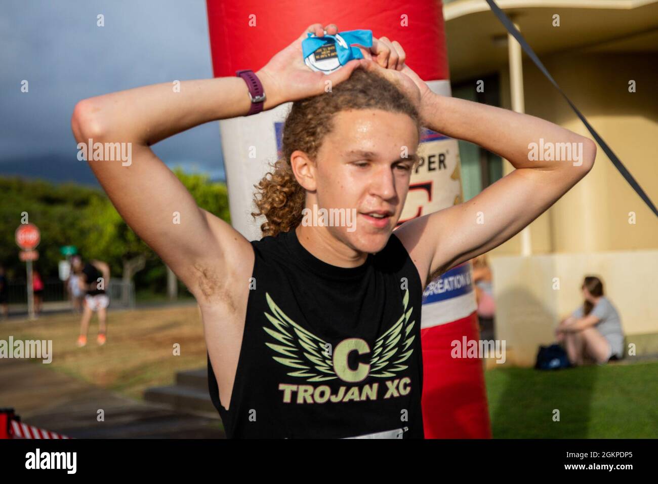Francis Fox, a race participant, finishes in first place during the ...
