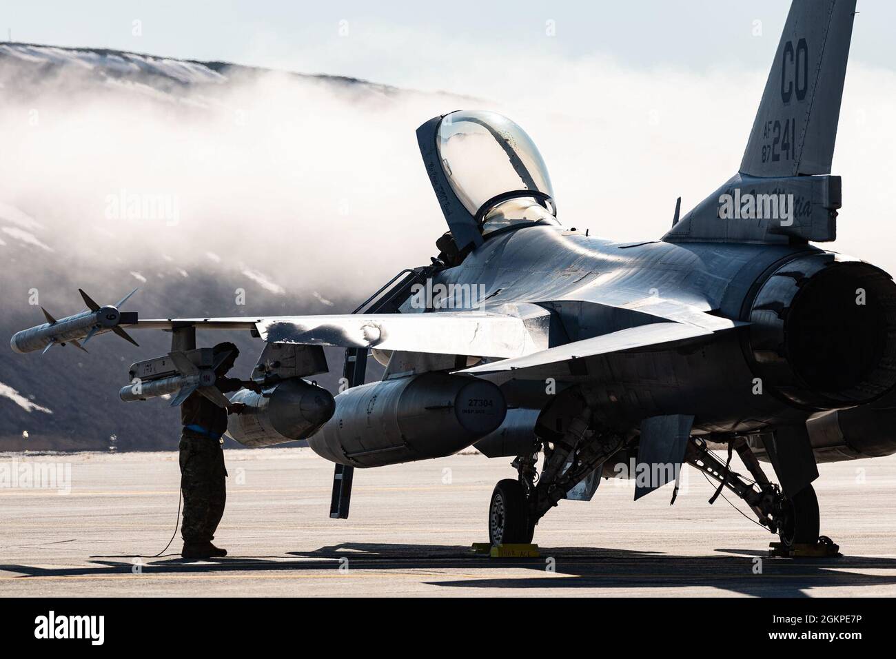 A United States Air Force aircraft maintenance technician conducts post ...