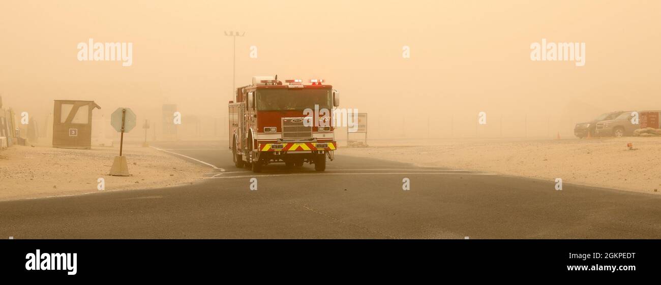 A fire truck with sirens on as firefighters respond to a call at Camp ...