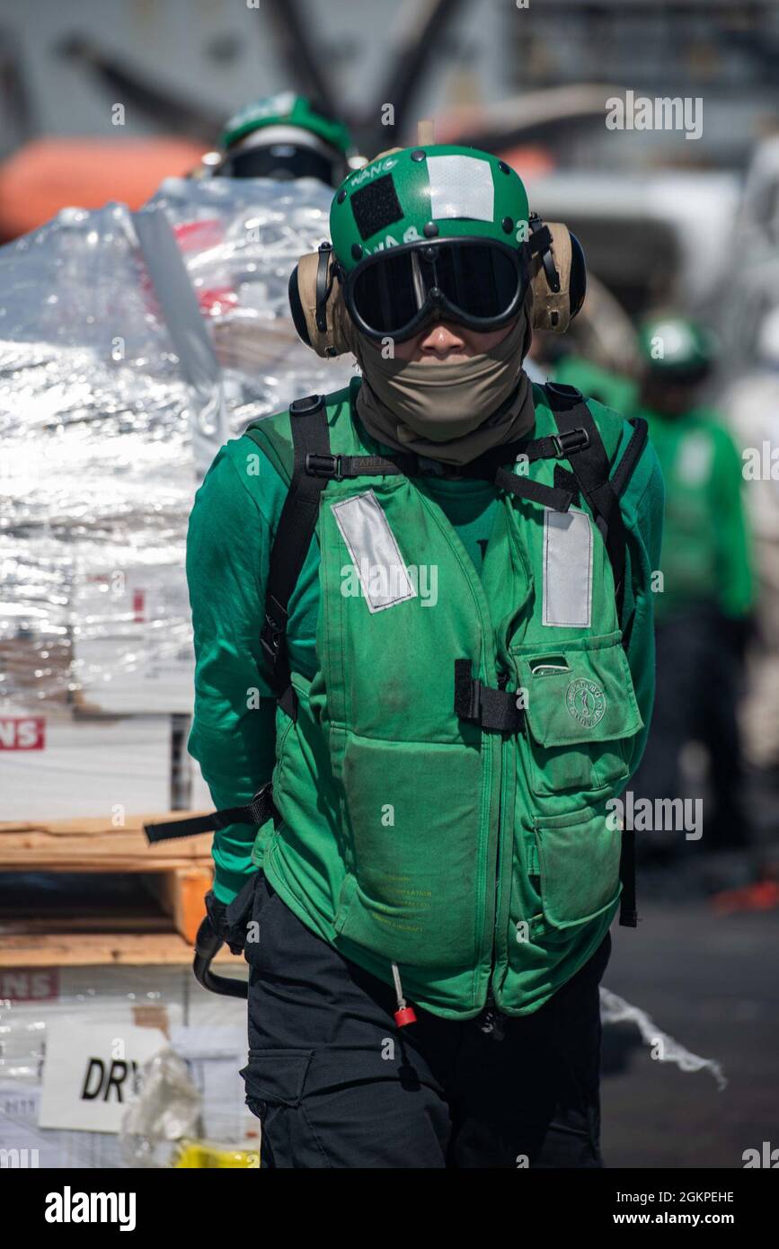 210613-N-ML137-1093 PHILIPPINE SEA (June 13, 2021) Logistics Specialist Seaman Tianyu Wang, from ...