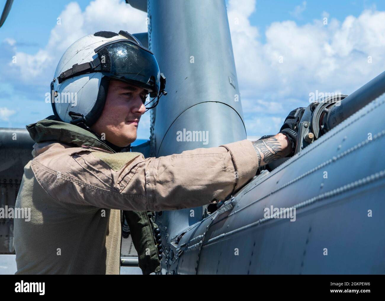 PHILIPPINE SEA (June 13, 2021) Naval Aircrewman (Helicopter) 2nd Class ...