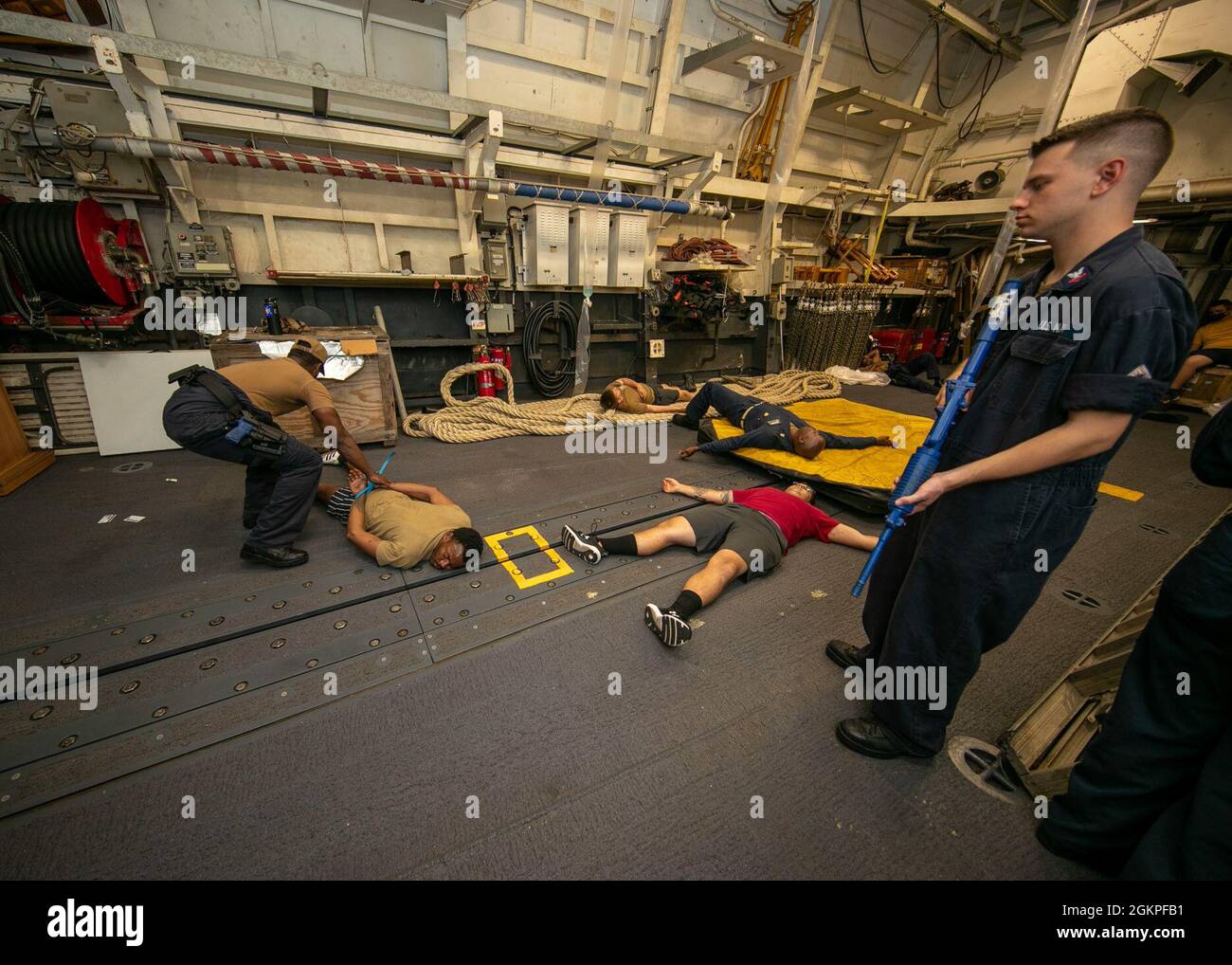 Sailors assigned to the Arleigh Burke-class guided missile destroyer ...