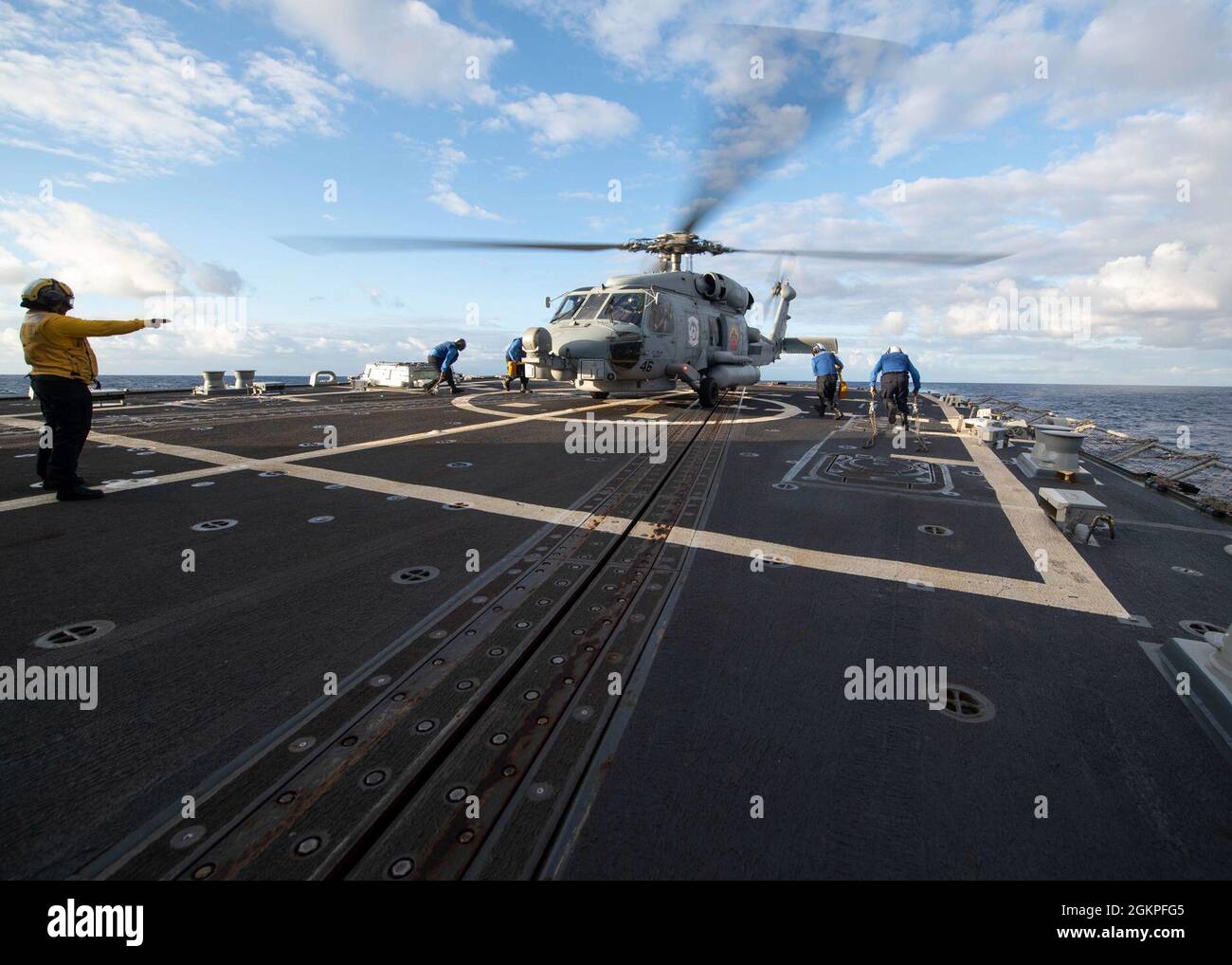 210613-N-CZ893-1220PACIFIC OCEAN (June 13, 2021) Sailors secure an MH ...