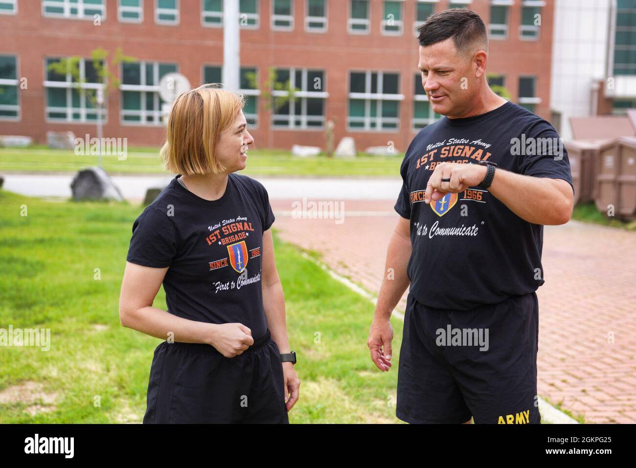Col. Anne Wiersgalla and Command Sgt. Maj. Jay High, the 1st Signal ...