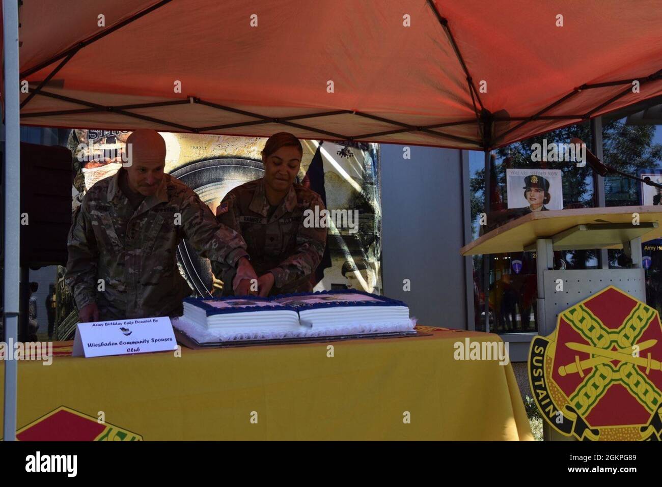 Gen. Christopher G. Cavoli and Spec. Aloyseia Ramirez cut the Army's ...
