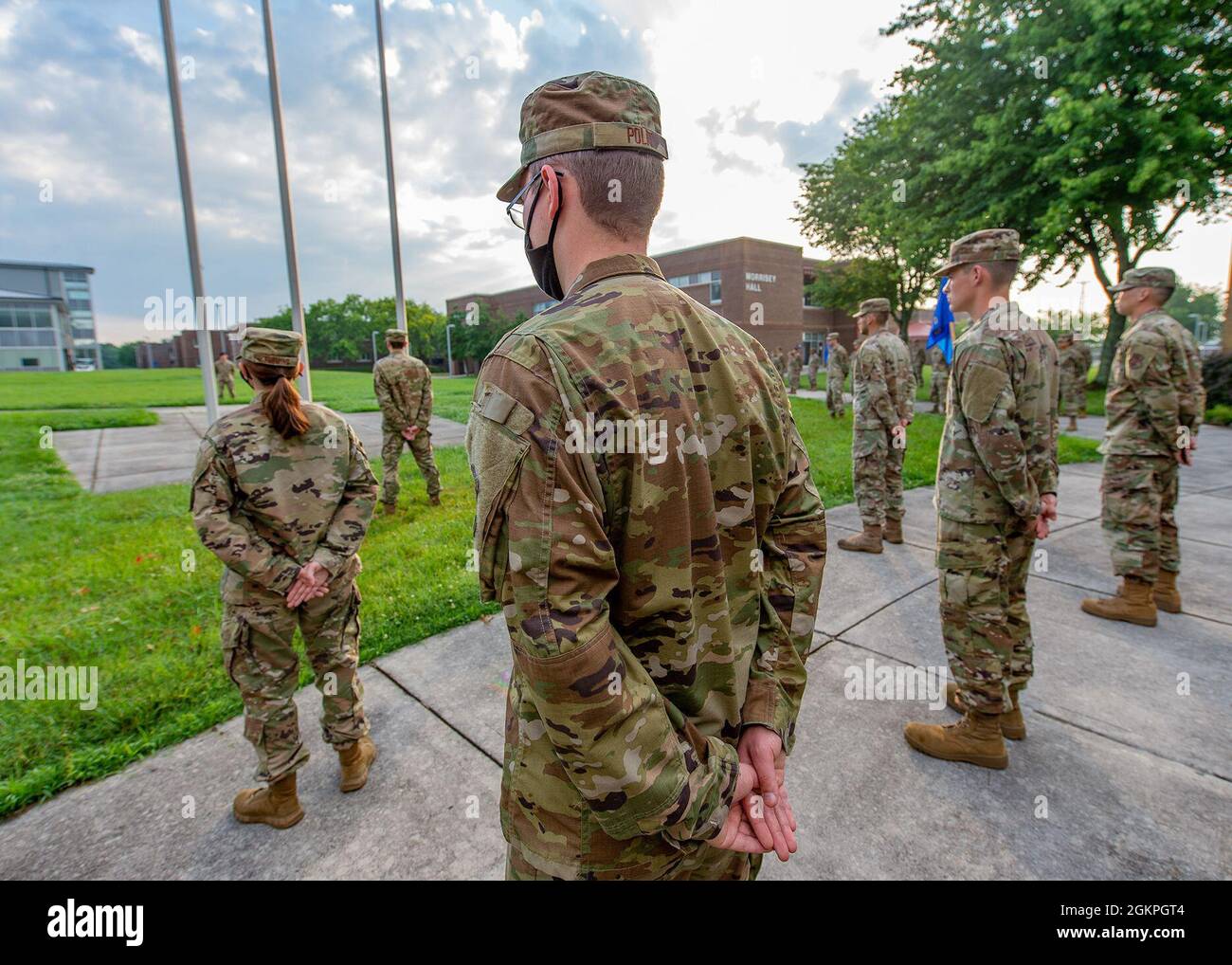 U.S. Air Force Airmen enrolled in Airman Leadership School raise the ...
