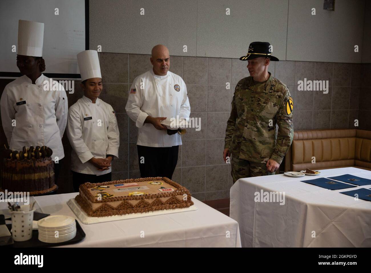 The 1st Cavalry Division command team judged a cake competition held by ...