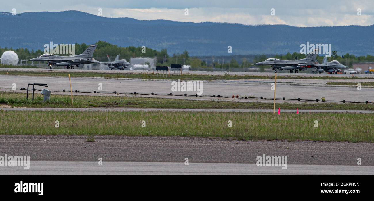 Two United States Air Force F-16 Fighting Falcons and two Royal ...