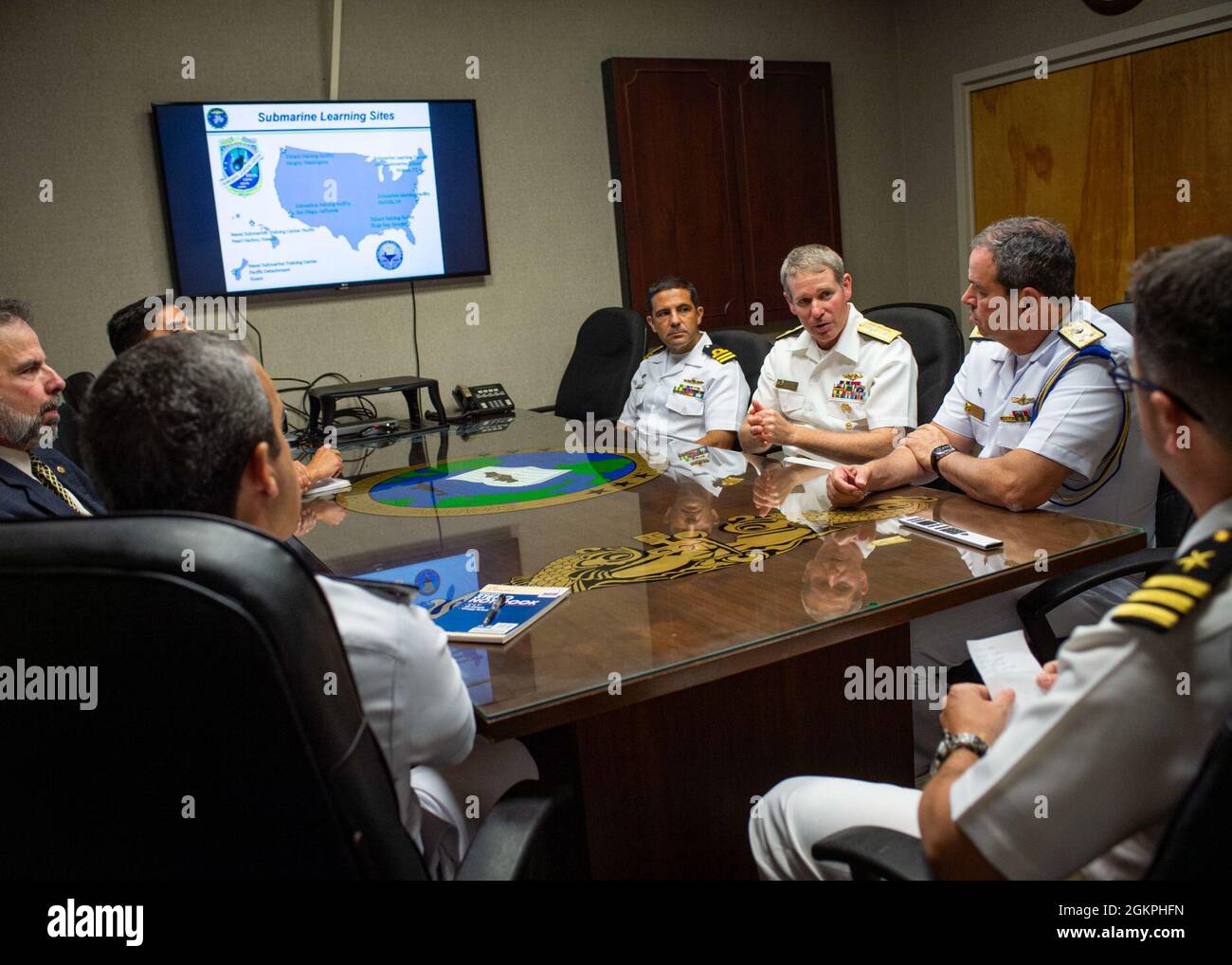 Rear Adm. Brian Davies, commander, Submarine Group Two, center right ...