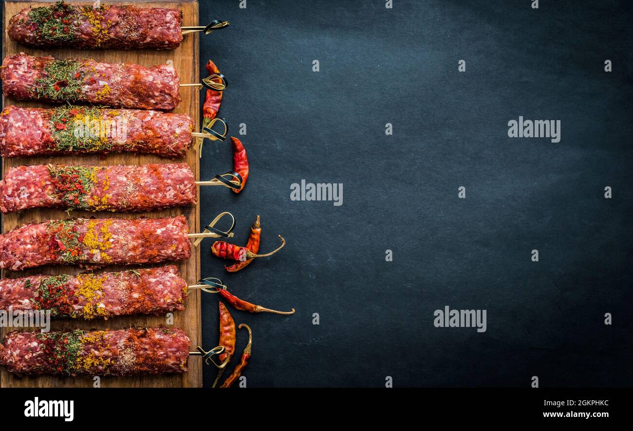 Raw kebab with pepper Stock Photo - Alamy